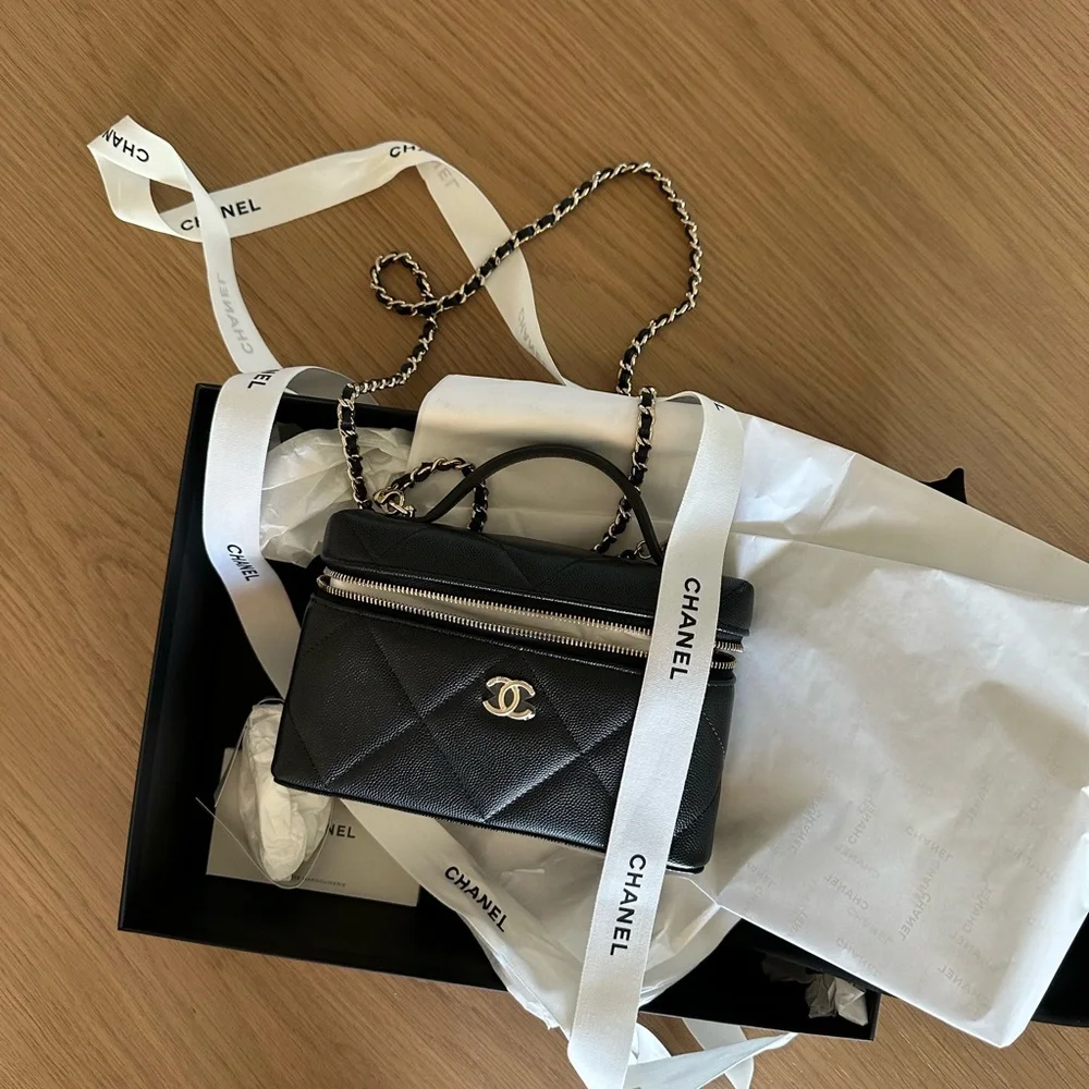 CHANEL | Bags | Chanel 25k Black Quilted Caviar Top Handle Slim Vanity ...
